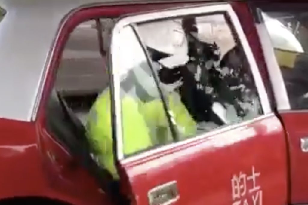 Rear taxi window shatters during an experiment conducted by HK traffic ...