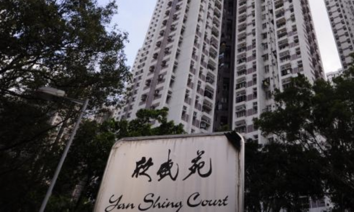 Man trapped by elevator door at Yan Shing Court in Fan Ling - Dimsum Daily