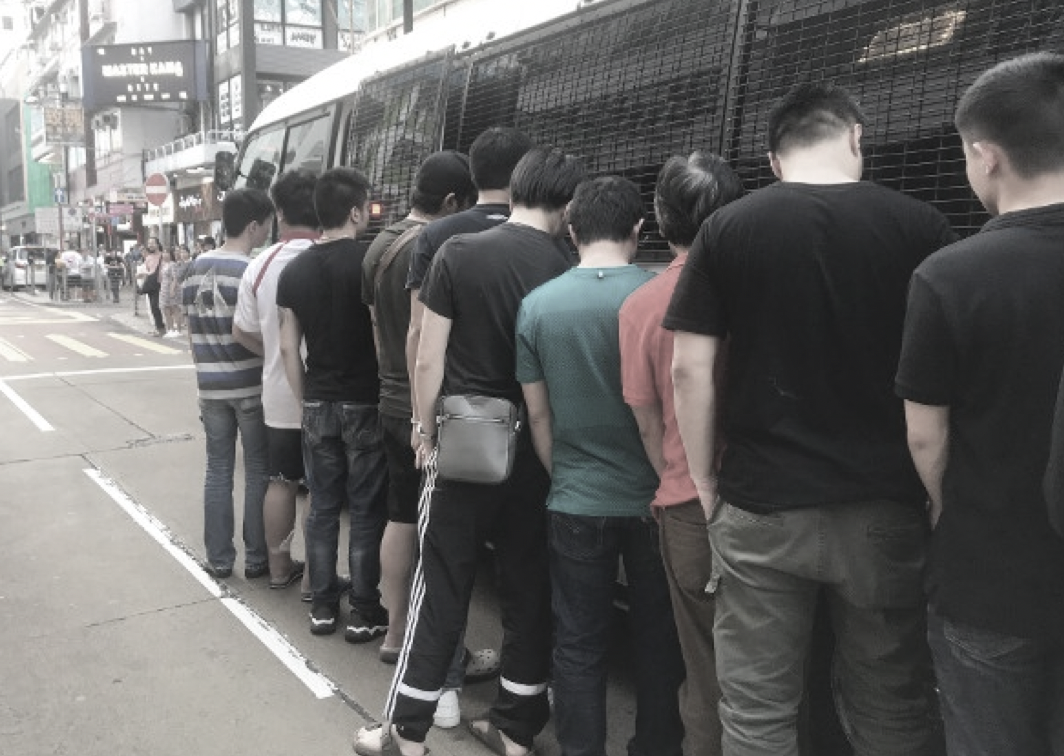 Police wreck two illegal gambling dens in Mong Kok and arrest 18 people ...