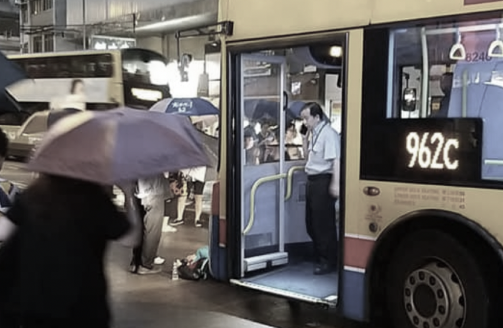 Woman trapped under the front of bus in North Point - Dimsum Daily