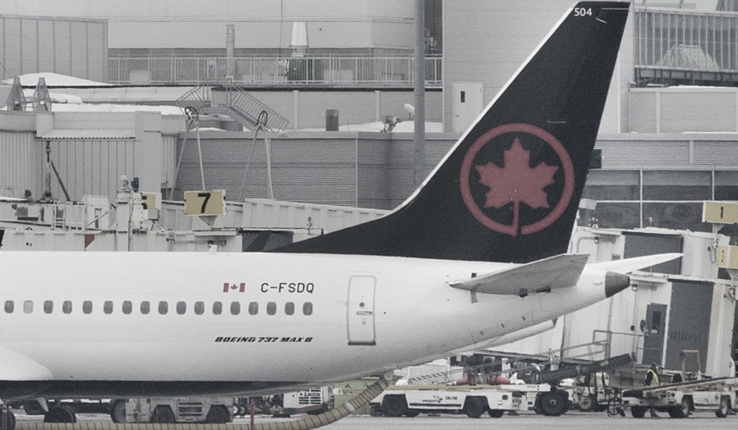 A female passenger stranded on Air Canada plane hours after it has ...