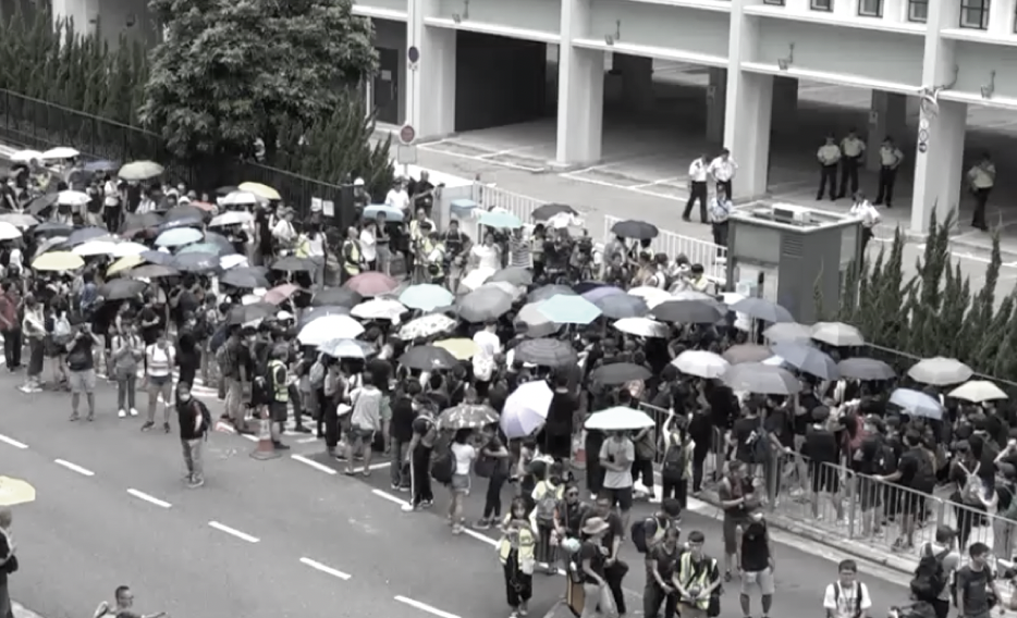 Hundreds of protestors gather at main entrance of Justice Place ...