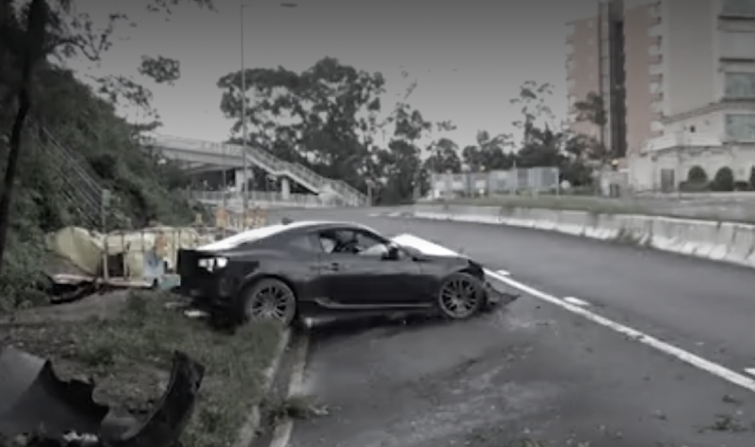 Car crashes into a slope after narrowly hitting a wild animal on Tai Po ...