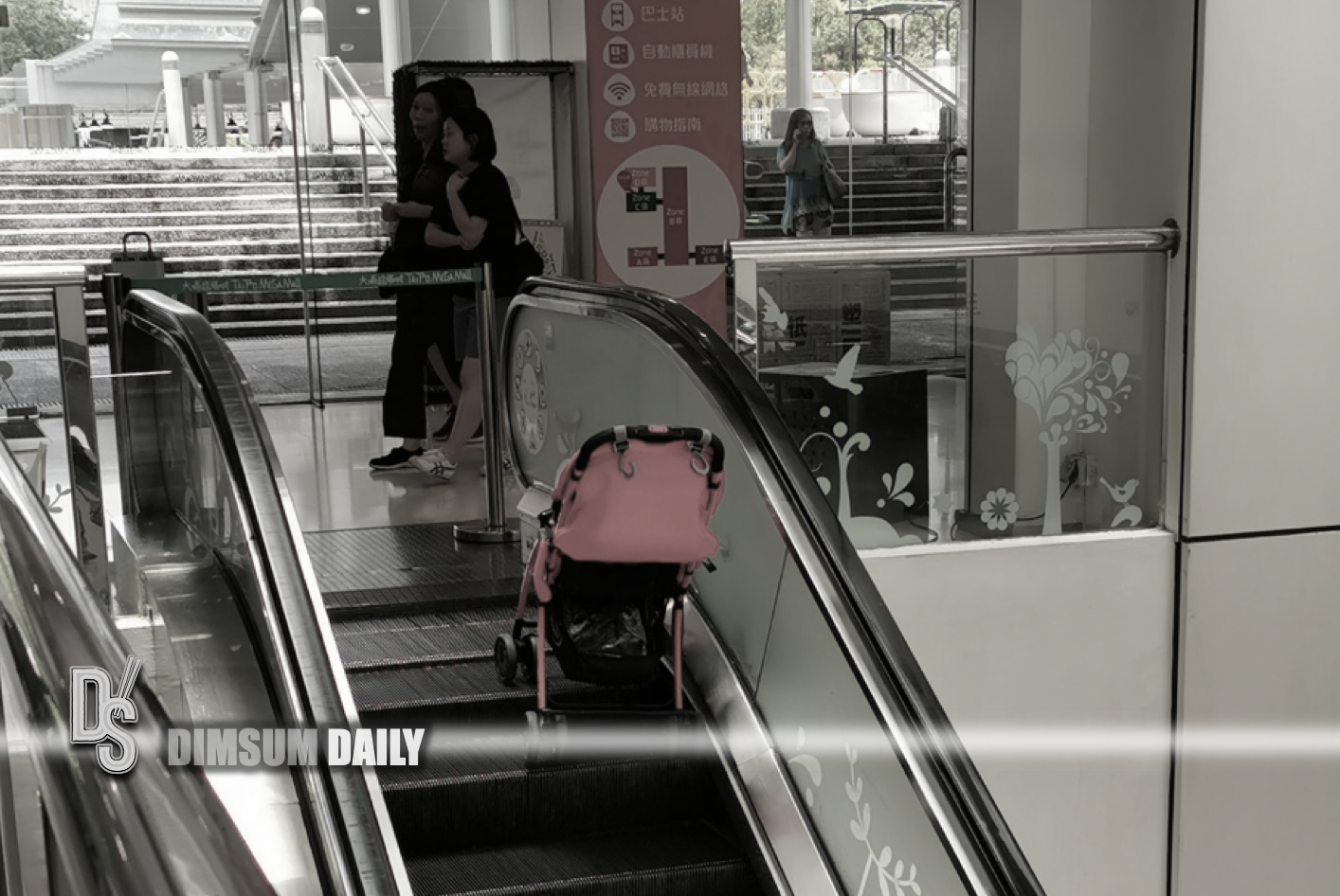 Baby stroller stranded and jammed on the escalator in Tai Po Mega Mall ...