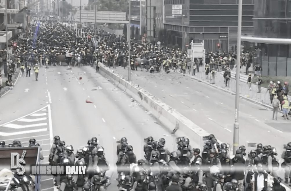 Riot police and protesters in tense stand off on Wai Yip Street, non ...