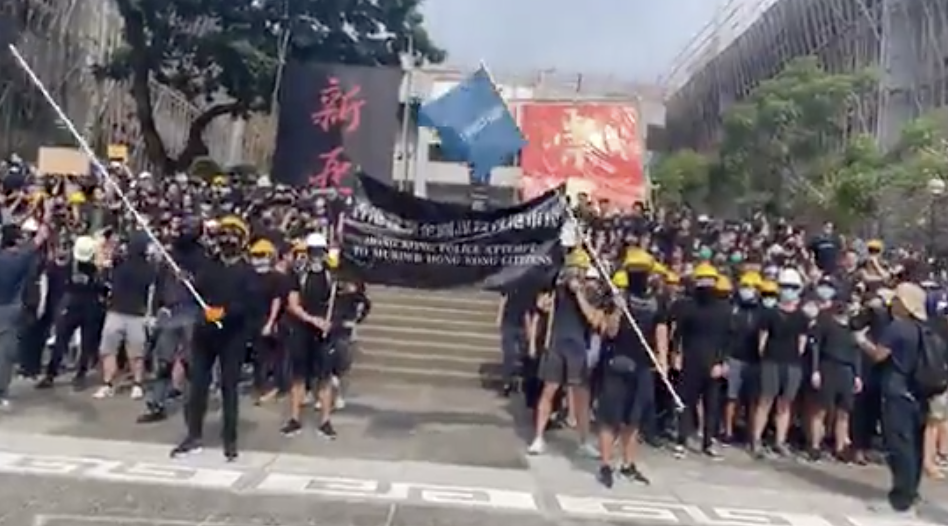 Freshmen and existing students clad in protesters' full gear attend ...