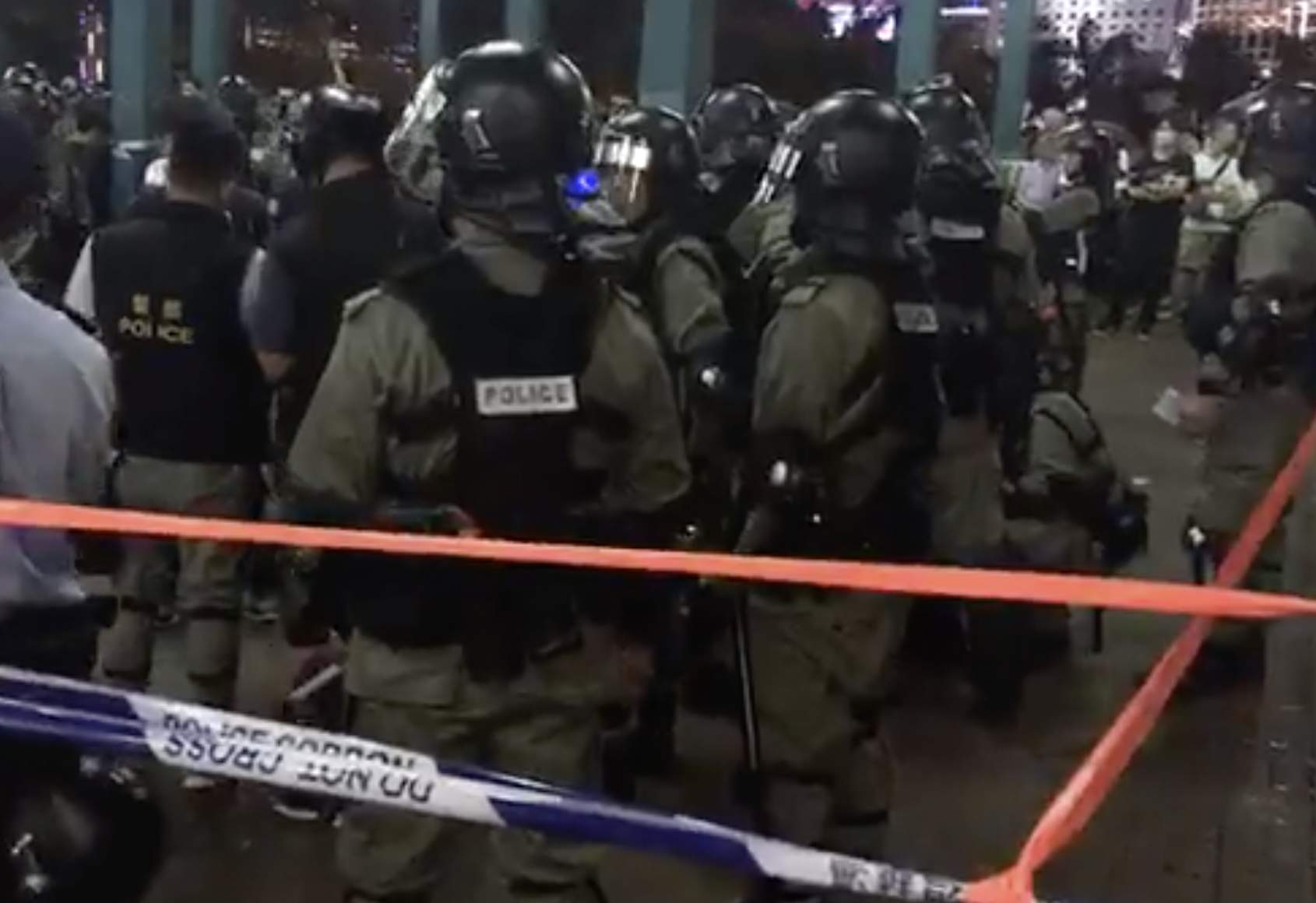 Riot police check on passengers arriving at Central Pier from Mui Wo ...