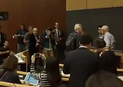 Chinese students sing the national anthem after Joshua Wong and Brian ...