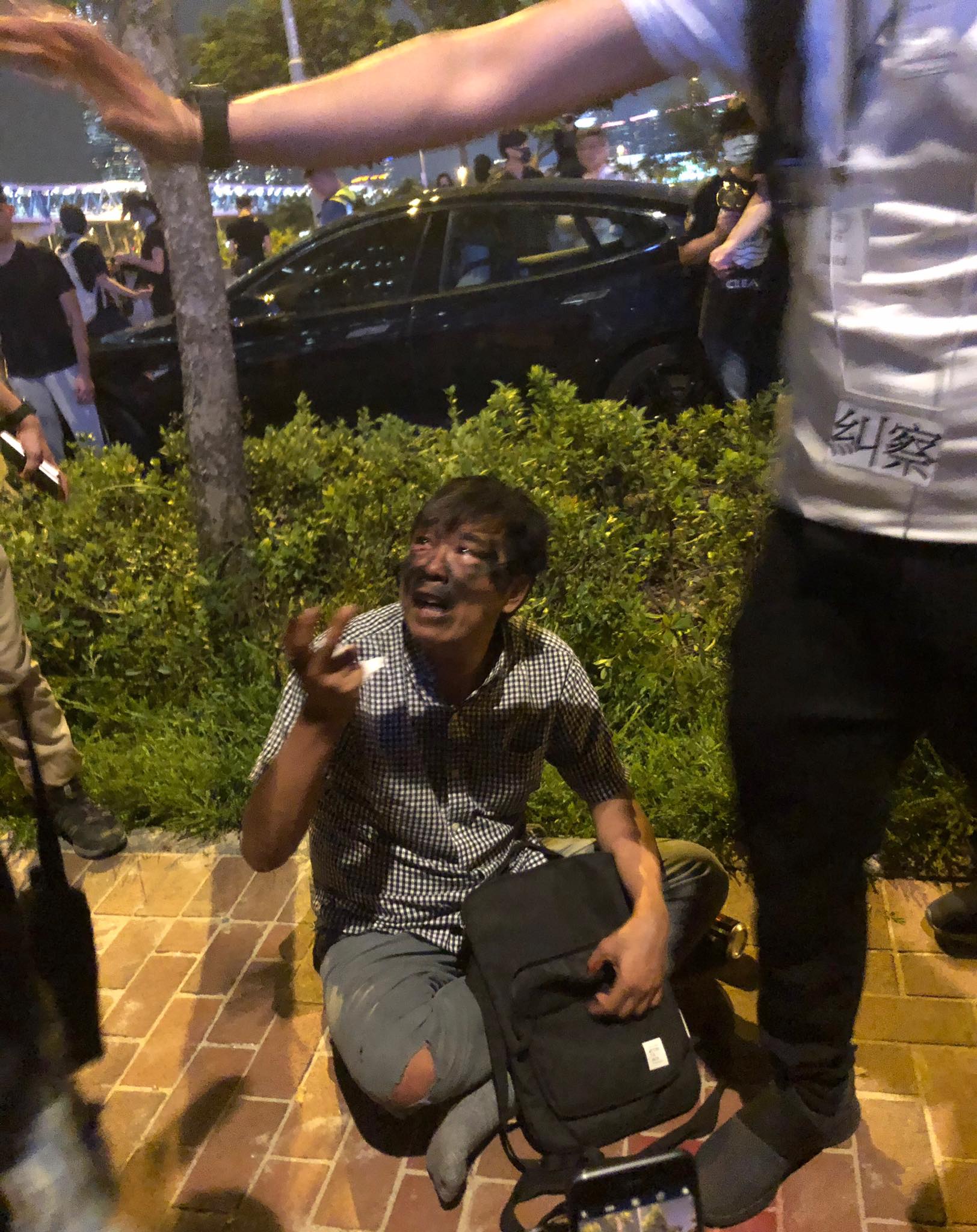 Man mobbed and struck by others after taking pictures of female ...