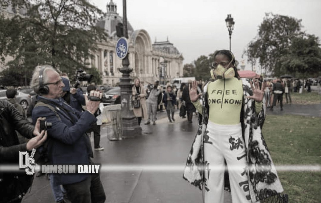 Fashionista dresses up as Hong Kong protester during Paris Fashion Week ...