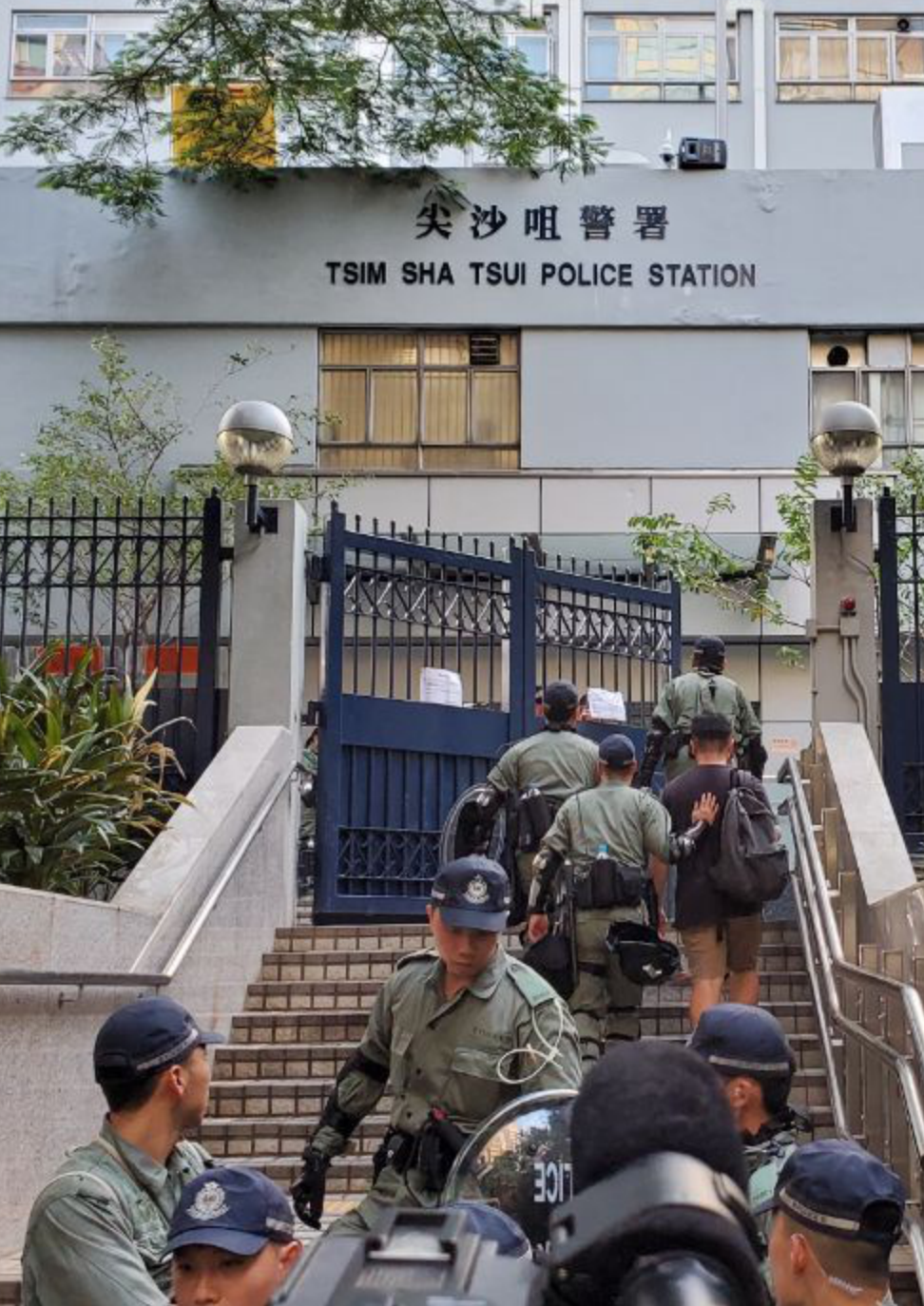 At least 90 protesters gather in front of TST police station while over ...