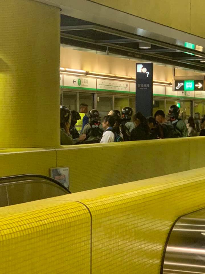 Student protesters obstruct train doors at multiple MTR stations ...