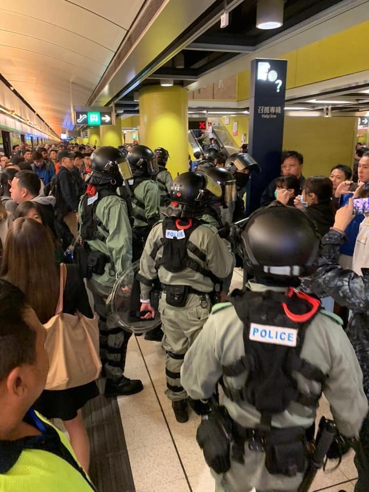 Student protesters obstruct train doors at multiple MTR stations ...