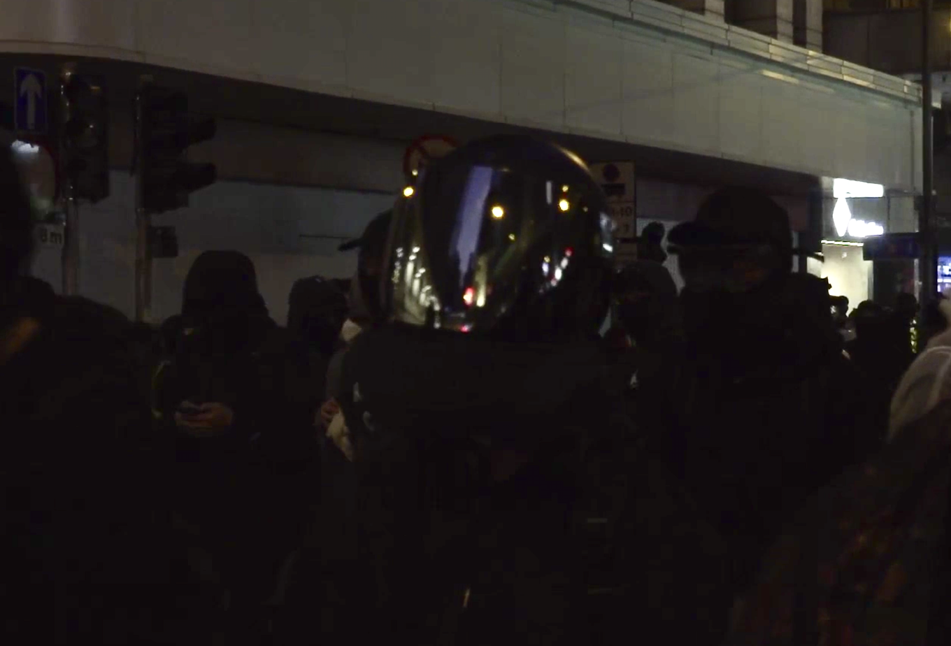 Frontline radicals and riot police in standoff on Des Voeux Road in ...