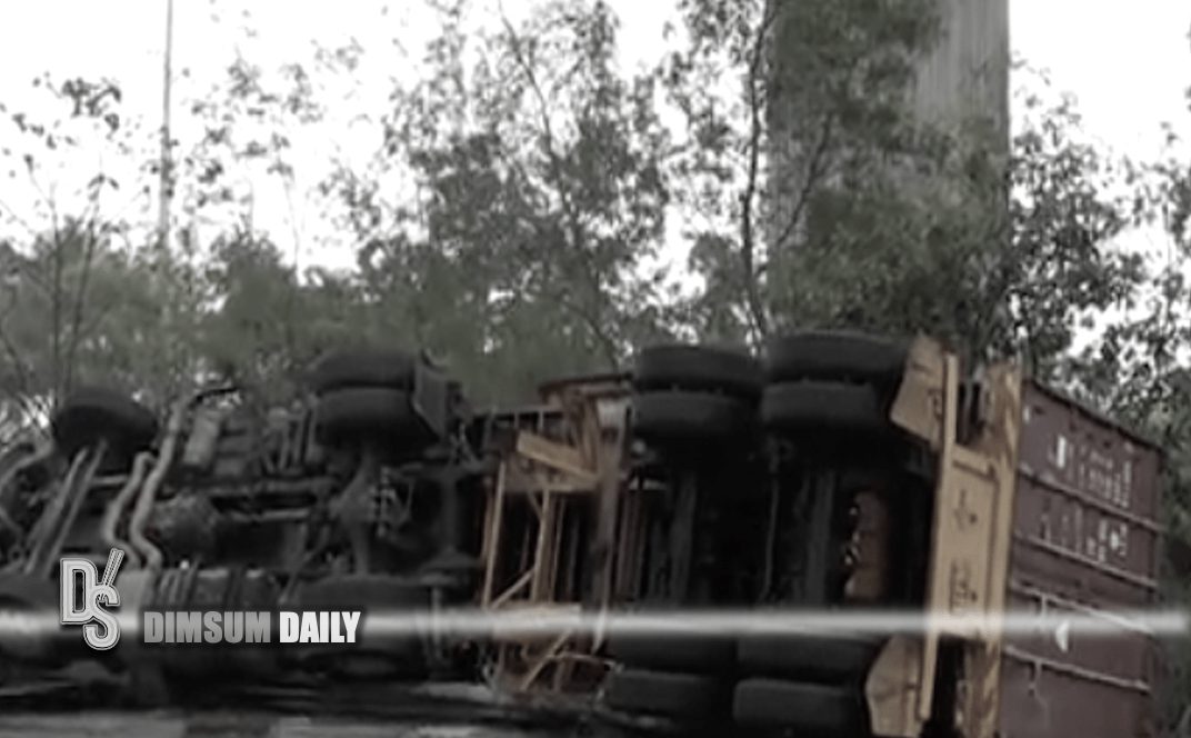 Haulage truck overturns while negotiating a corner on Lin Cheung Road ...