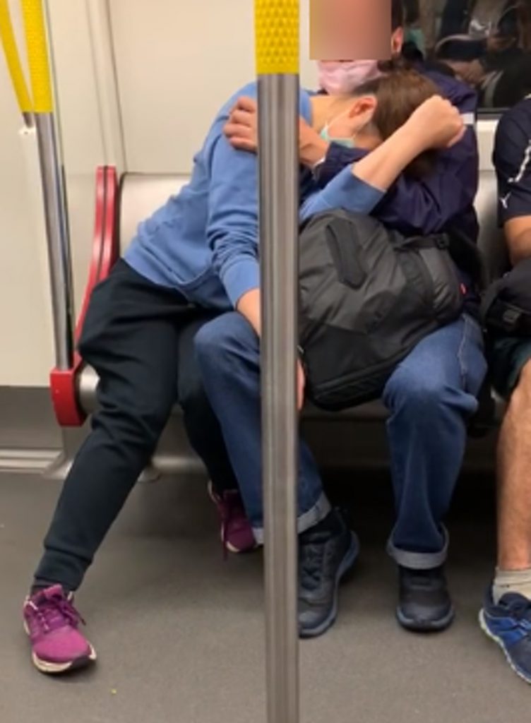 Middle-aged couple openly engage in indecent behaviour on MTR train ...