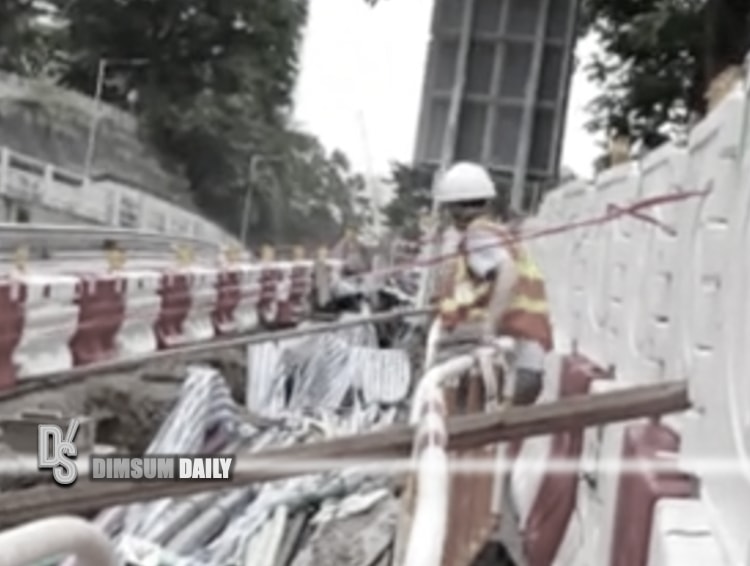 Woman trapped after a water-filled barricade falls on her on Pok Fu Lam ...
