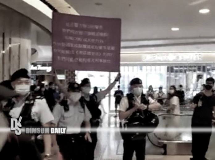 One protester turns up at Popcorn Mall today to shout slogans before ...