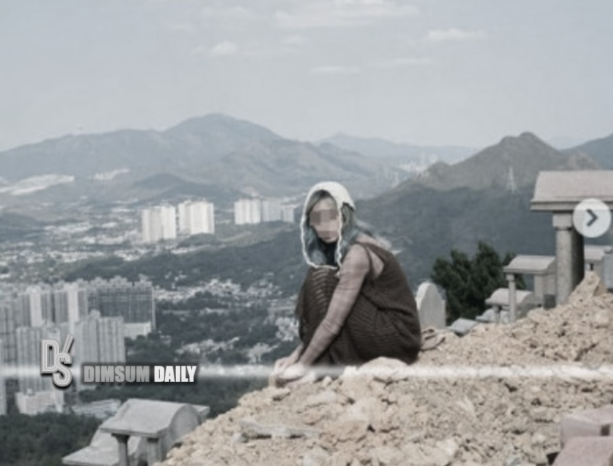 Photographer takes pictures of model posing in front of tombstones at ...