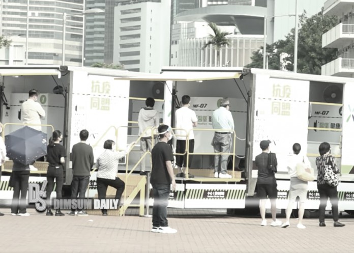 Hundreds queue at mobile sampling station at Edinburgh Place in Central ...