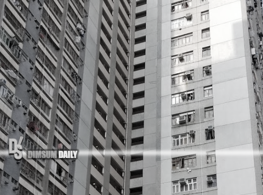 Woman sits precariously at window in Cheung Hong Estate in Tsing Yi ...