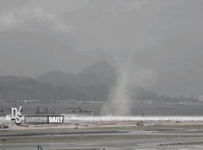 Dust whirl formed at Chek Lap Kok airport construction site - Dimsum Daily