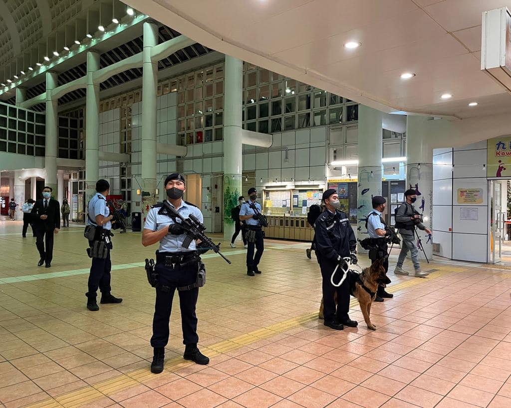 Police officers spotted in high-profile patrol at polling stations ...