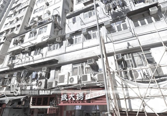 Persons present at Block A, Hoi Tao Building in Kennedy Town to undergo ...