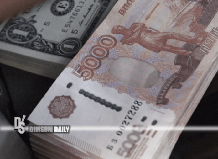 The Russian rouble crashes more than 40% after trading began on Monday ...