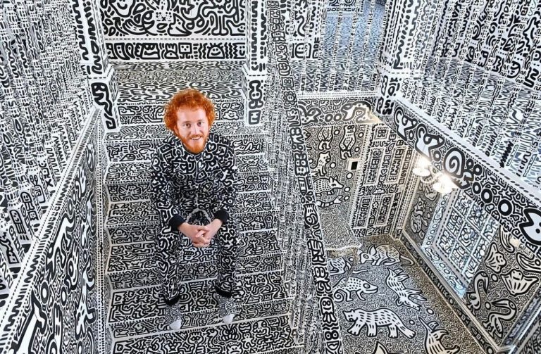 British artist Sam Cox shows off his new home with signature doodle art ...