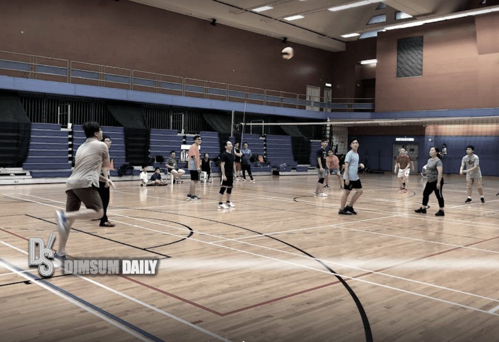 Man hits his head against another person's head during volley ball game ...