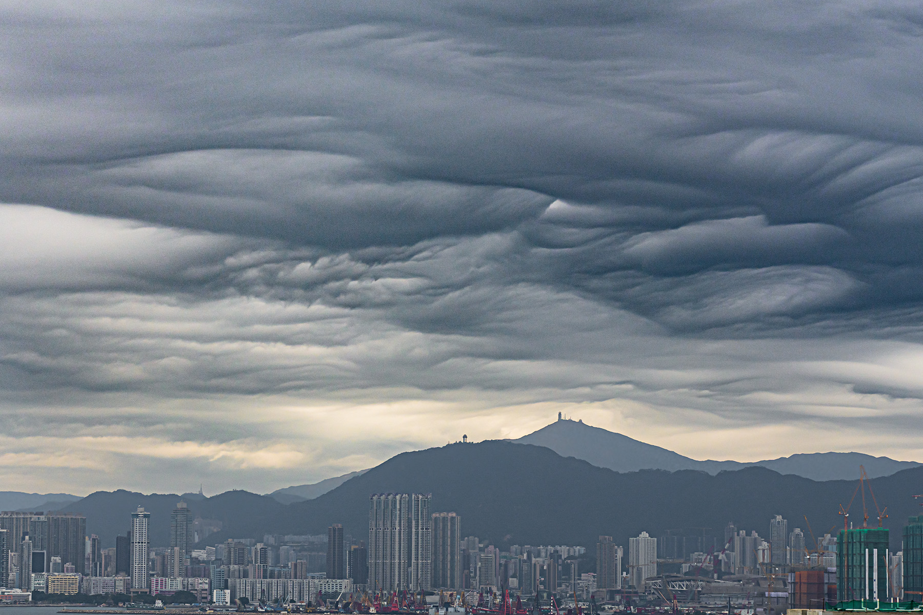 Rare cloud formation known as Asperitas seen in various parts of Hong ...