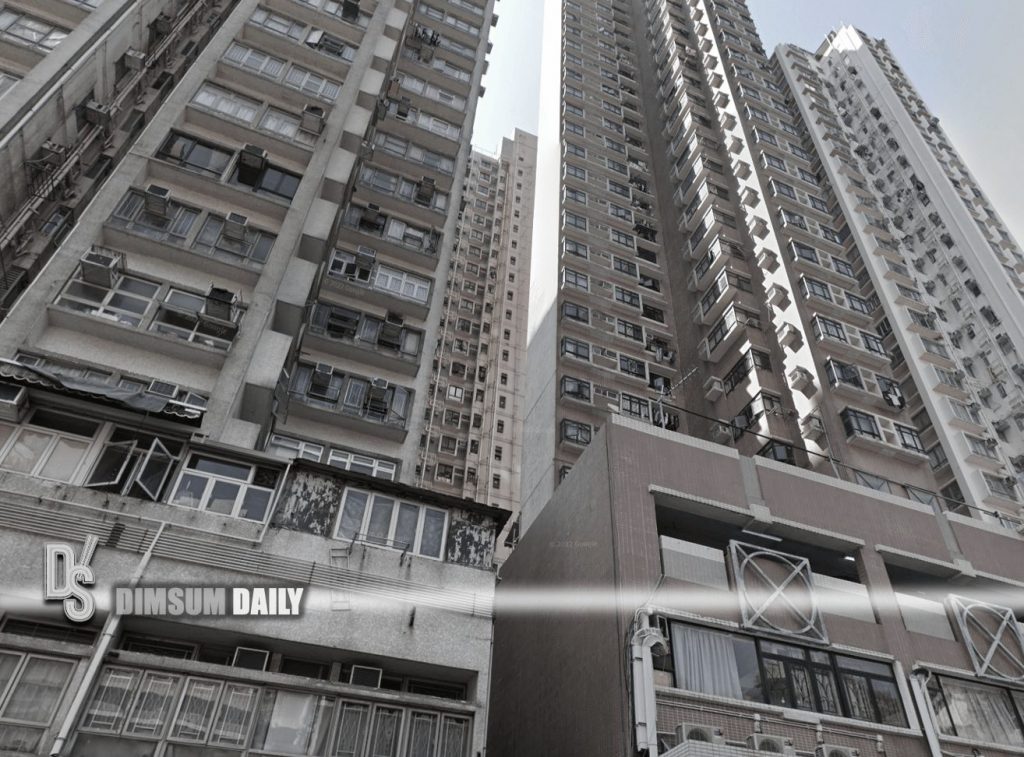 40-year-old woman sits precariously on window ledge at Yee King Court ...