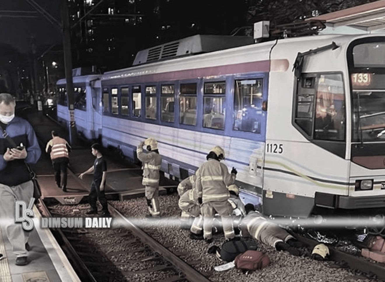 Male food courier trapped under light rail at Tin Heng stop in Tin Shui ...