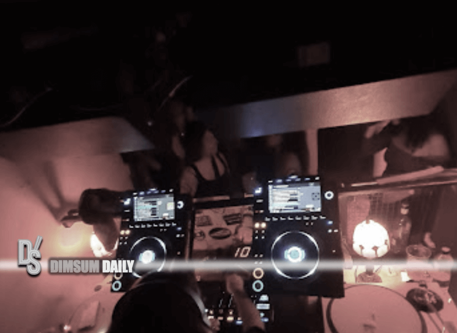 Partygoers dance to AI DJ in a unique experimental rave in London club ...