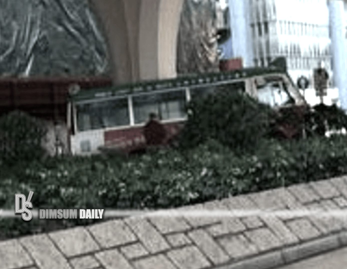 Taxi crashes onto a flowerbed after colliding with minibus on Hoi Bun ...