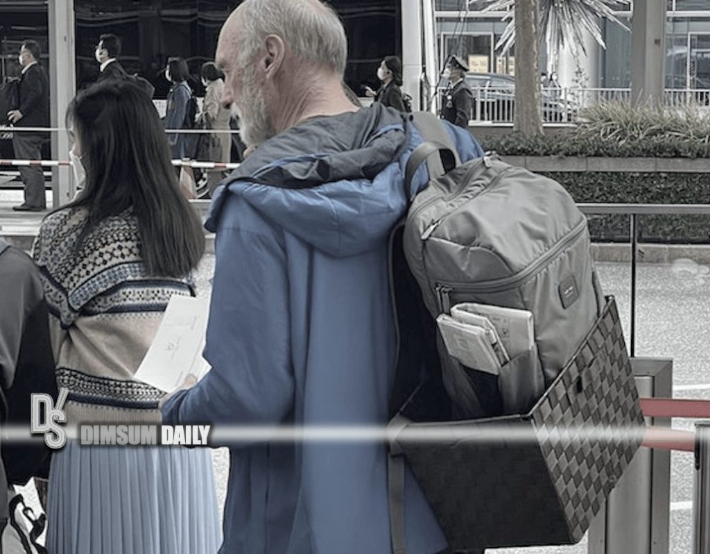 Elderly tourist spotted with backpack stuck in restaurant basket while ...