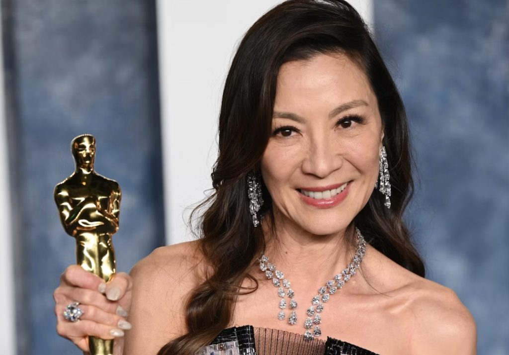 Oscar-winning Michelle Yeoh brings gold statutte to visit late father's ...