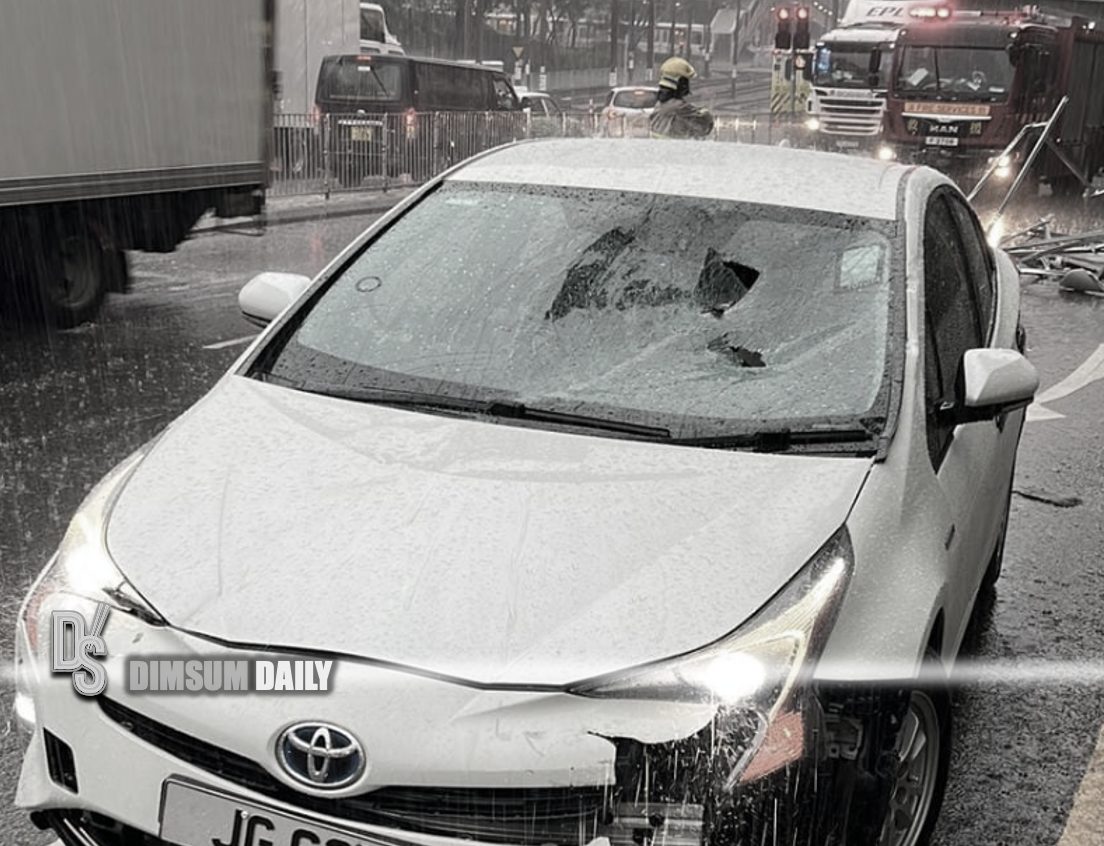 Flying debris damages car in Tuen Mun during strong winds, driver ...