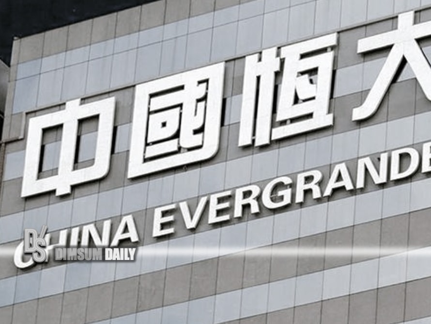 China's Evergrande group announces sale of two businesses to ...