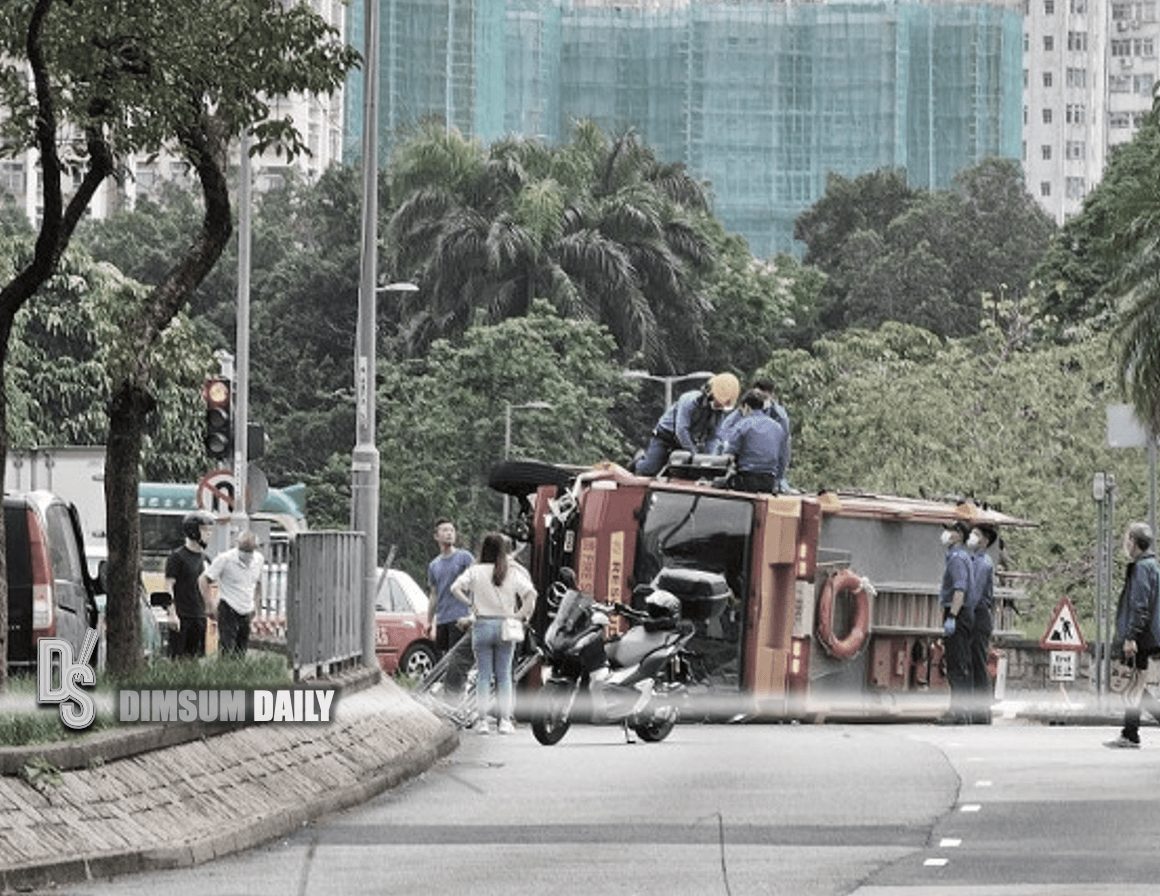 Fire engine overturns after colliding with divider in Tai Po - Dimsum Daily