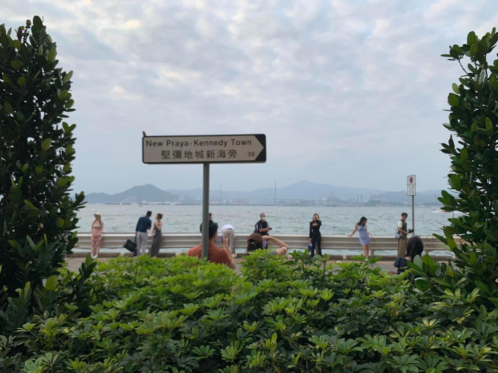 Tourists and locals continue to ignore traffic while taking photos on ...