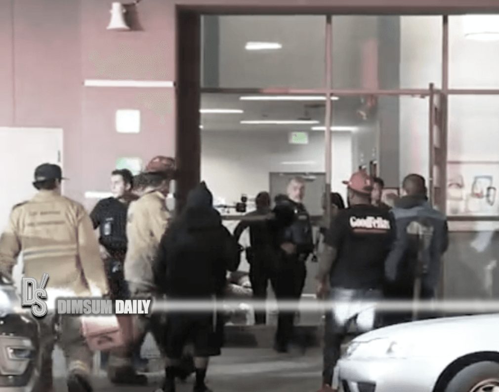 Gunman injures four people in shooting outside a luxury residential ...