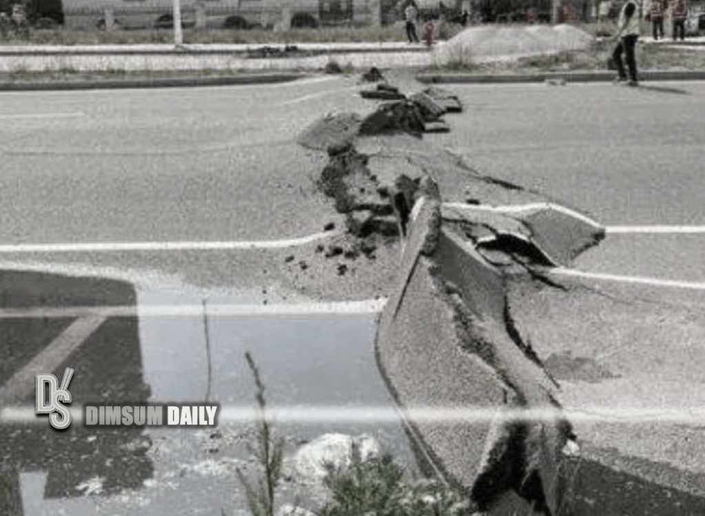 Large cracks in streets force evacuation of thousands from high-rise ...