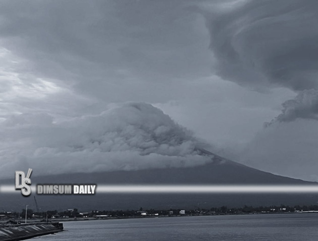 Thousands evacuate as Philippine volcano spews ash and toxic gases ...