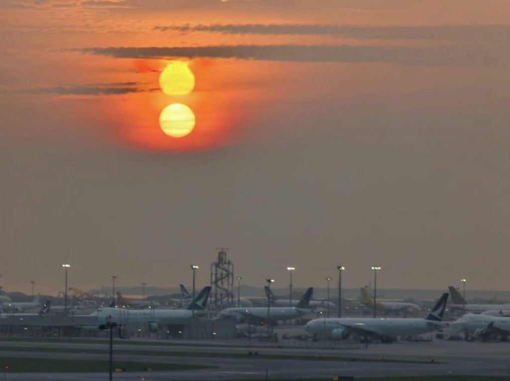 Spectacular double sun phenomenon captured at Chek Lap Kok Airport ...