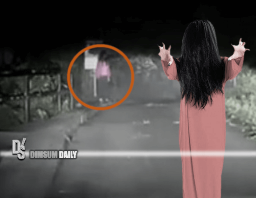 Mysterious 'female ghost in red dress' spotted again, this time on the ...