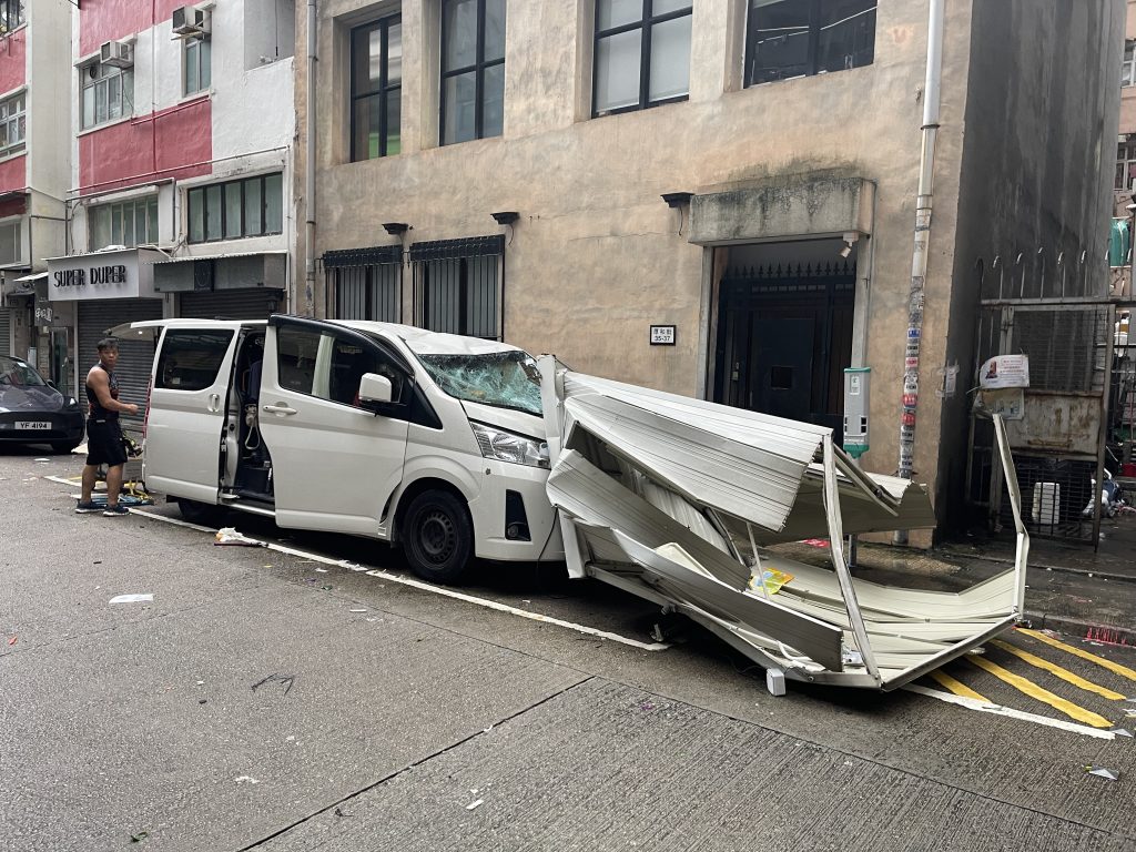 Van crushed as prefabricated structure soars from Kennedy Town rooftop ...