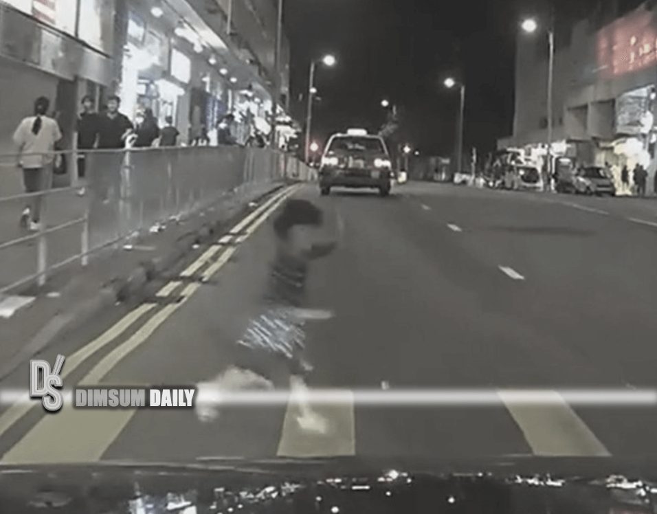 Young girl narrowly escapes accident while crossing the road in Tuen ...