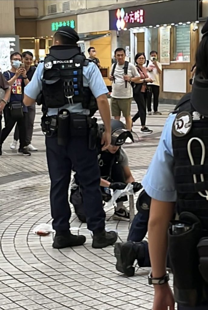 Multiple police officers apprehend knife-wielding suspect at Amoy Plaza ...